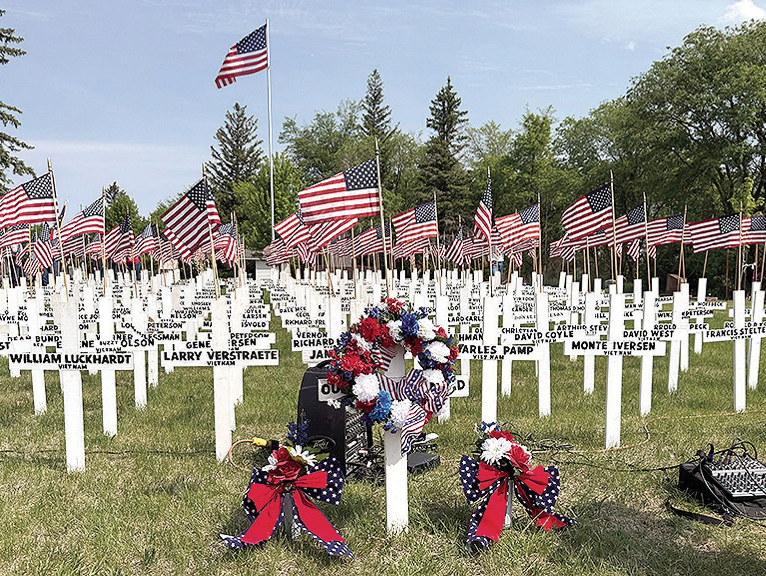 Pastor Ryan Petersen addresses gathering at Bethel Cemetery